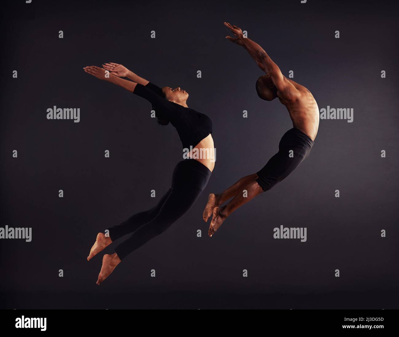 Freedom of flight. A female and male contemporary dancer performing a ...