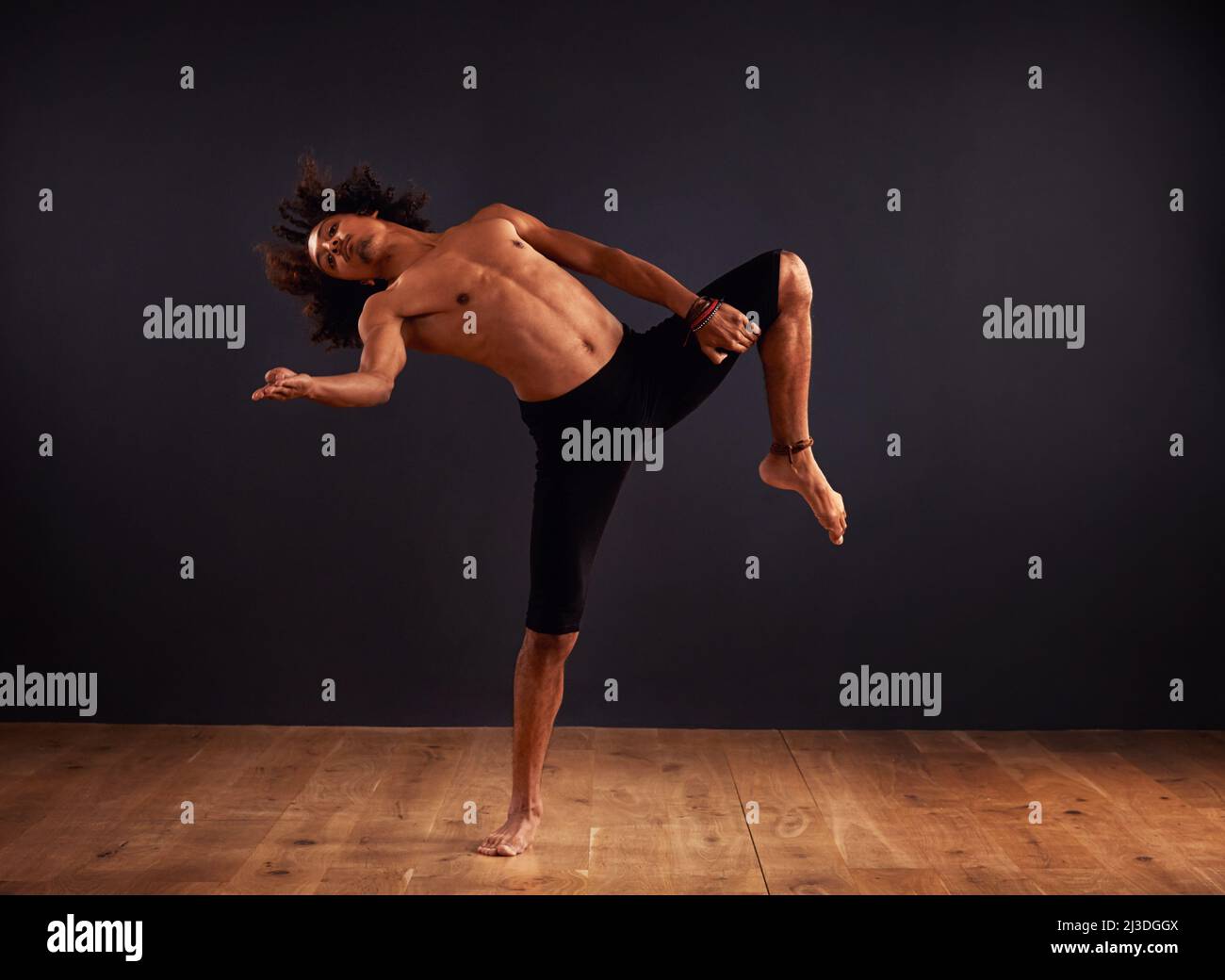 Free form expression. Male contemporary dancer performing a dramatic ...