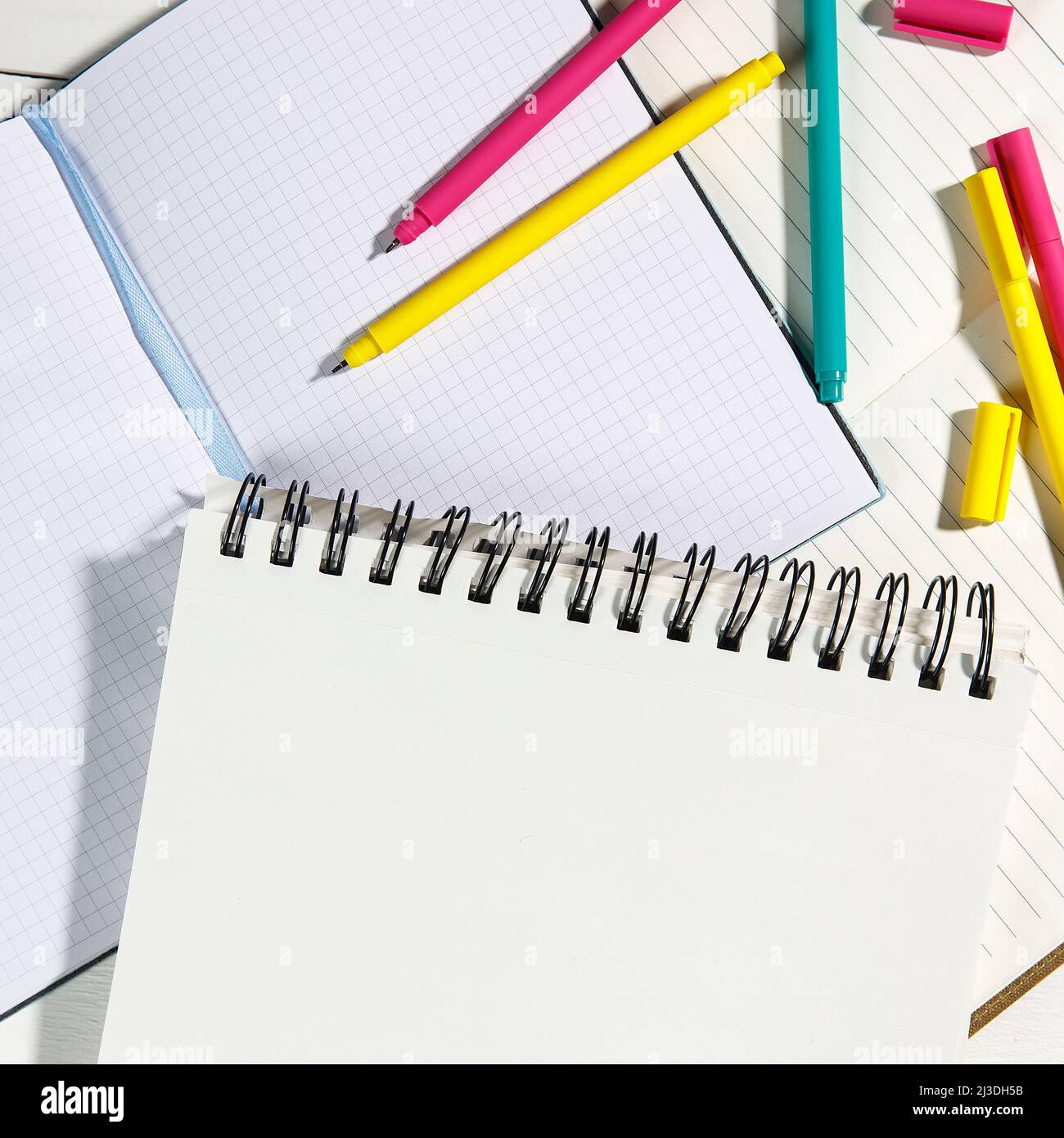 Layout for the office. Back to school. A notebook, colorful pens, felt ...