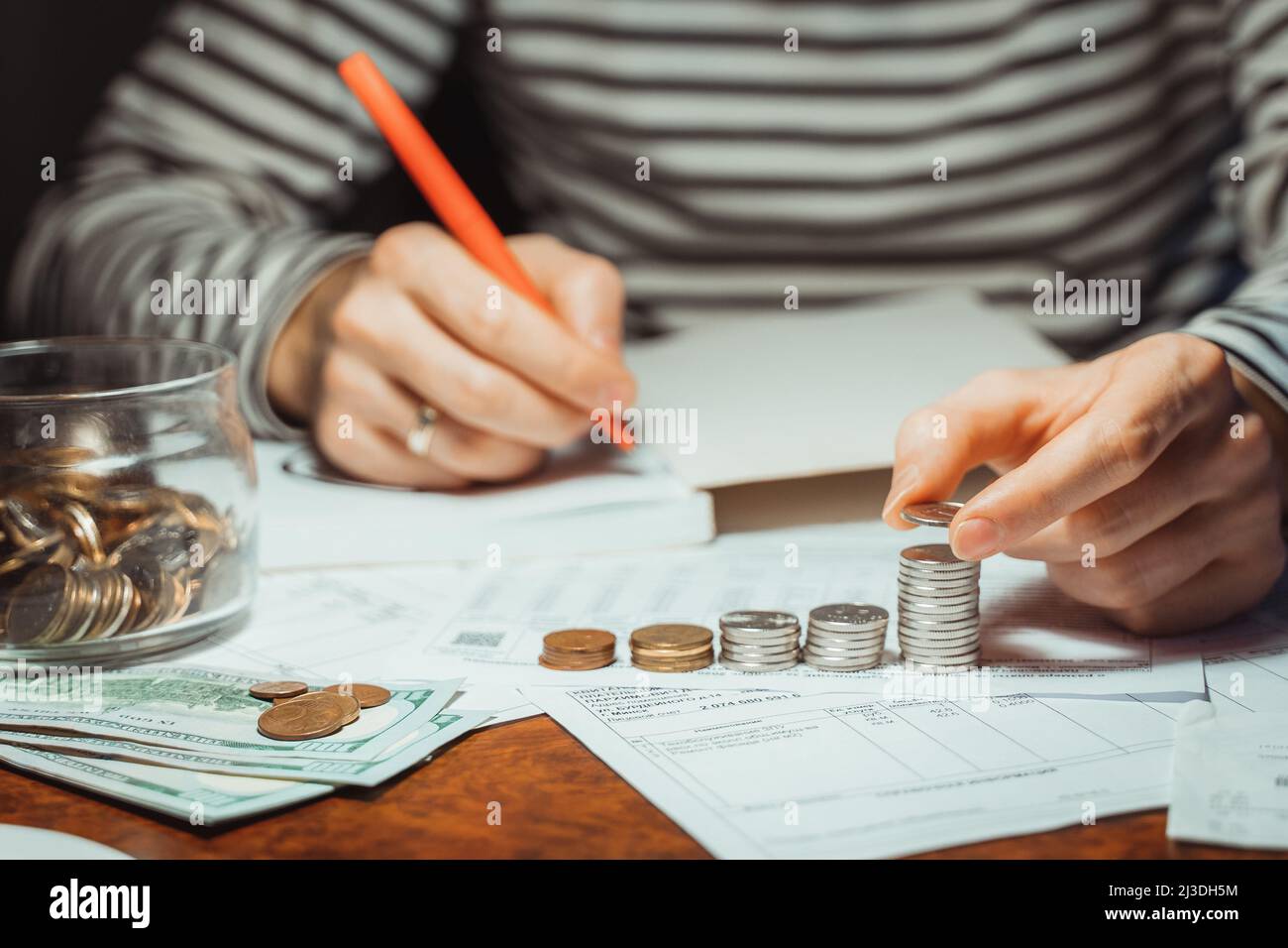 Close up cropped frustrated man calculating monthly expenses, managing ...