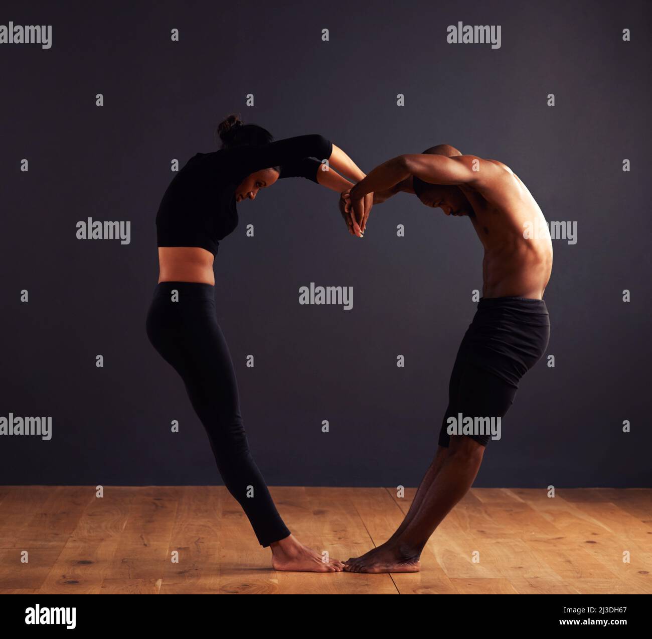 Unity is strength. A female and male contemporary dancer performing a ...