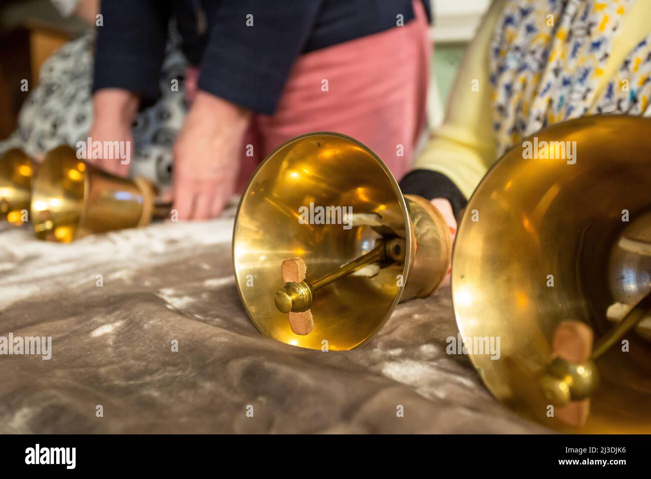Hand bell ringers hi-res stock photography and images - Alamy