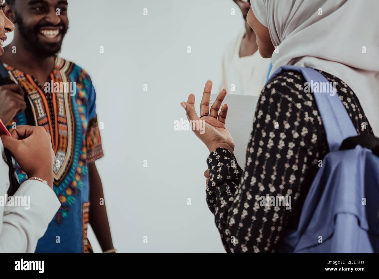 Group of happy african students having conversation and team meeting ...