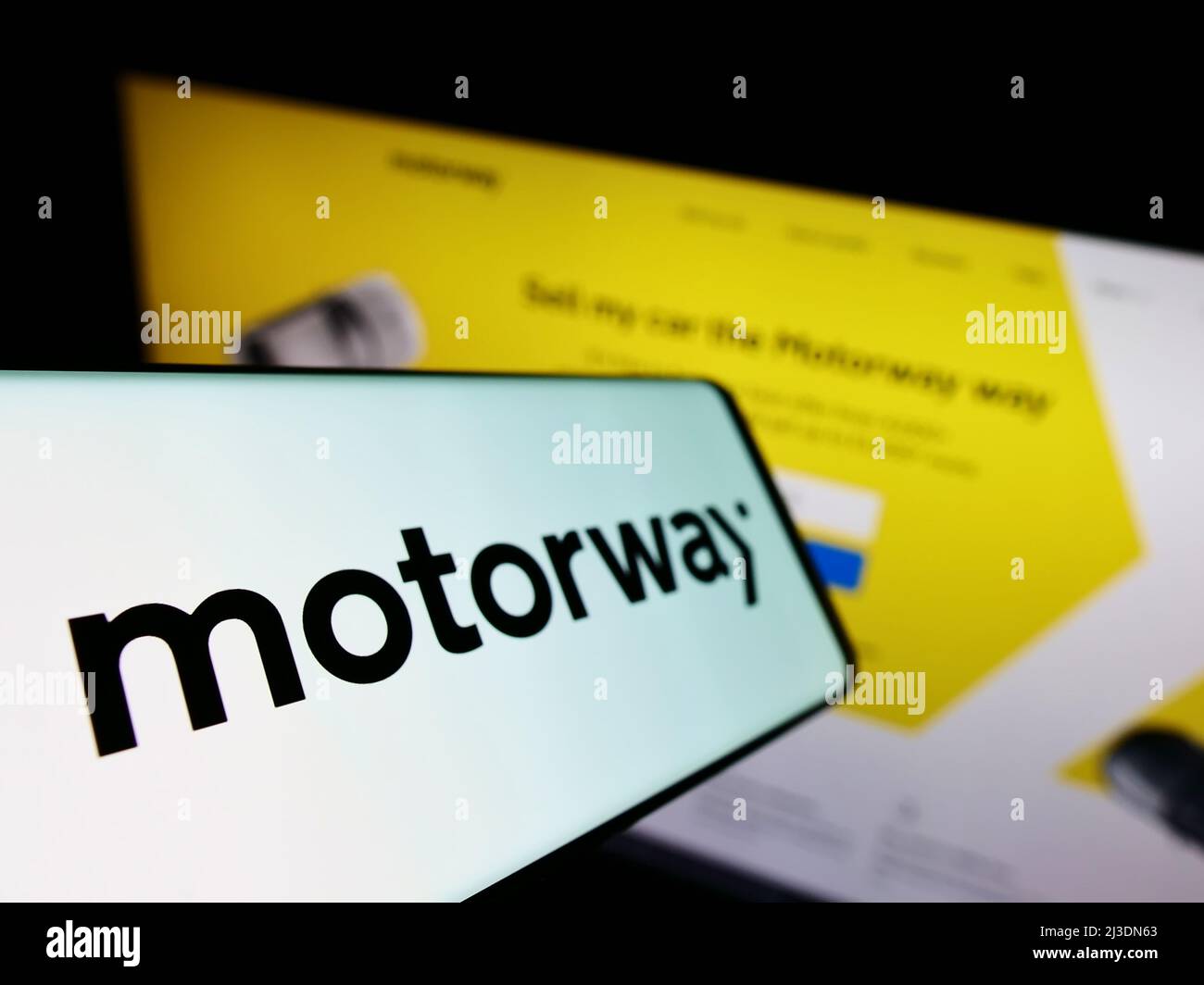 Smartphone with logo of British car dealer company Motorway Online Ltd ...