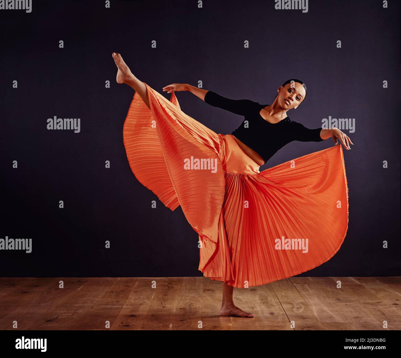 Free form dancing. Female contemporary dancer in a dramatic pose ...