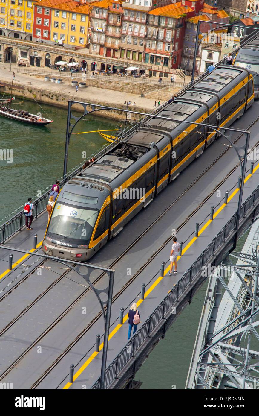 Metro do Porto tram crossing Pont Luiz 1 bridge over the River Douro ...