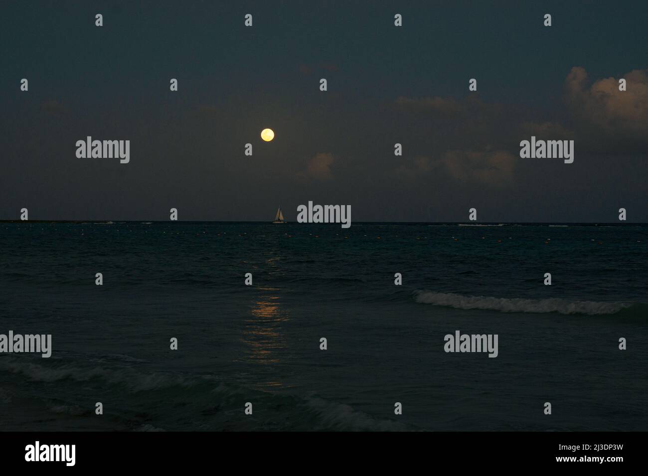 full moon with the reflection in the ocean Stock Photo - Alamy