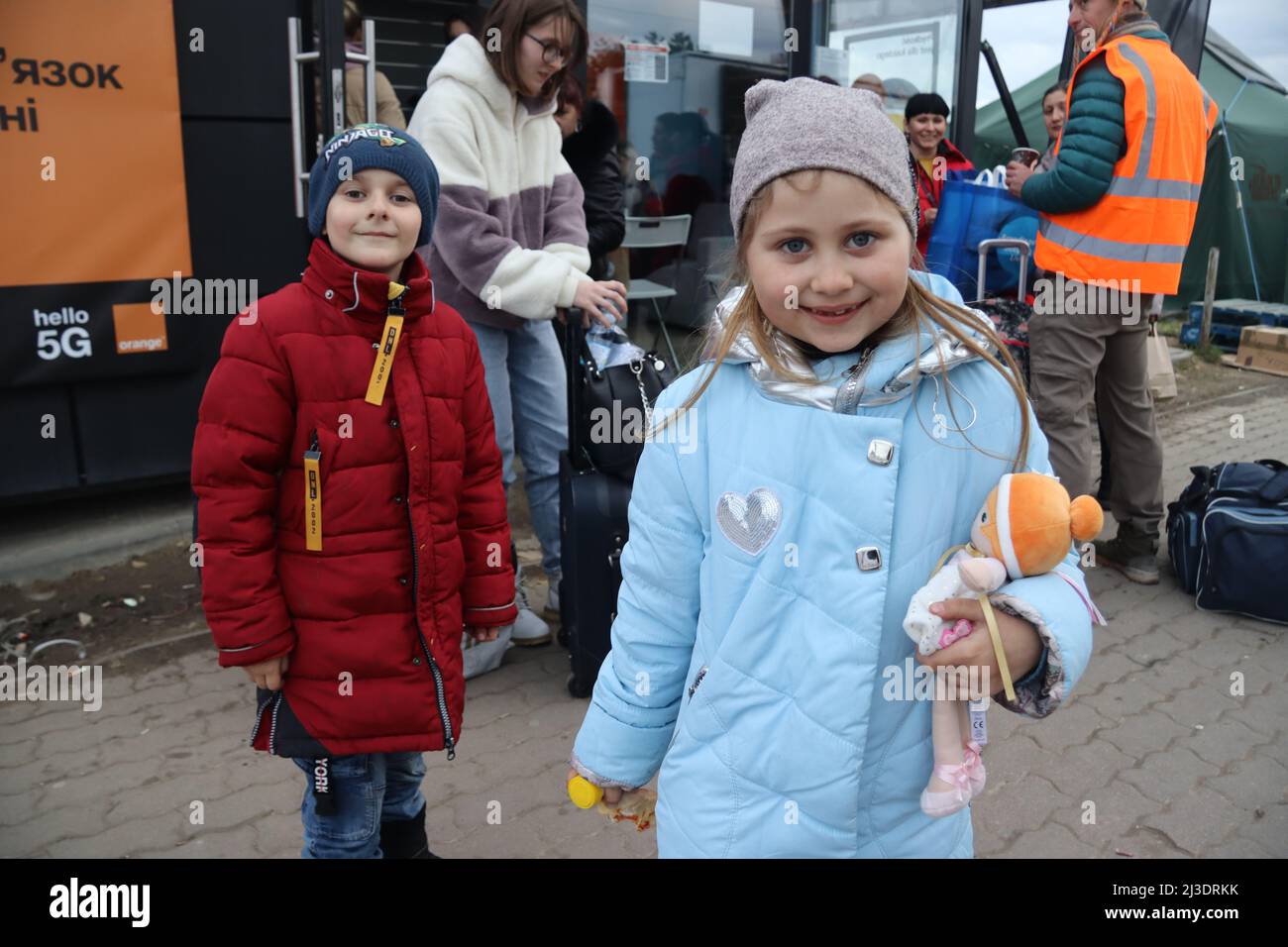 Kids orange vests hi-res stock photography and images - Alamy