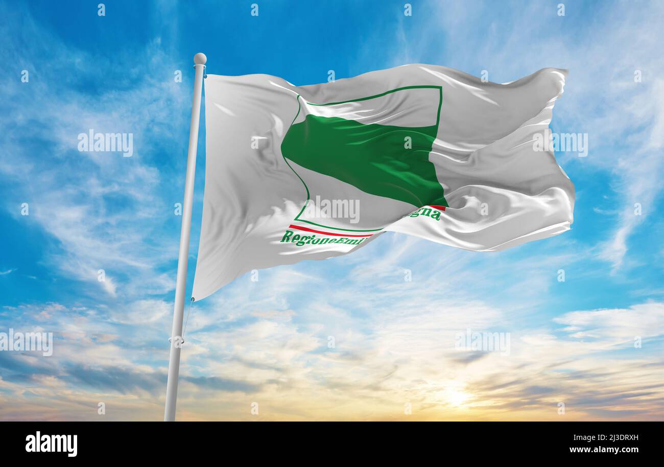 flag of Emilia Romagna, Italy at cloudy sky background on sunset ...