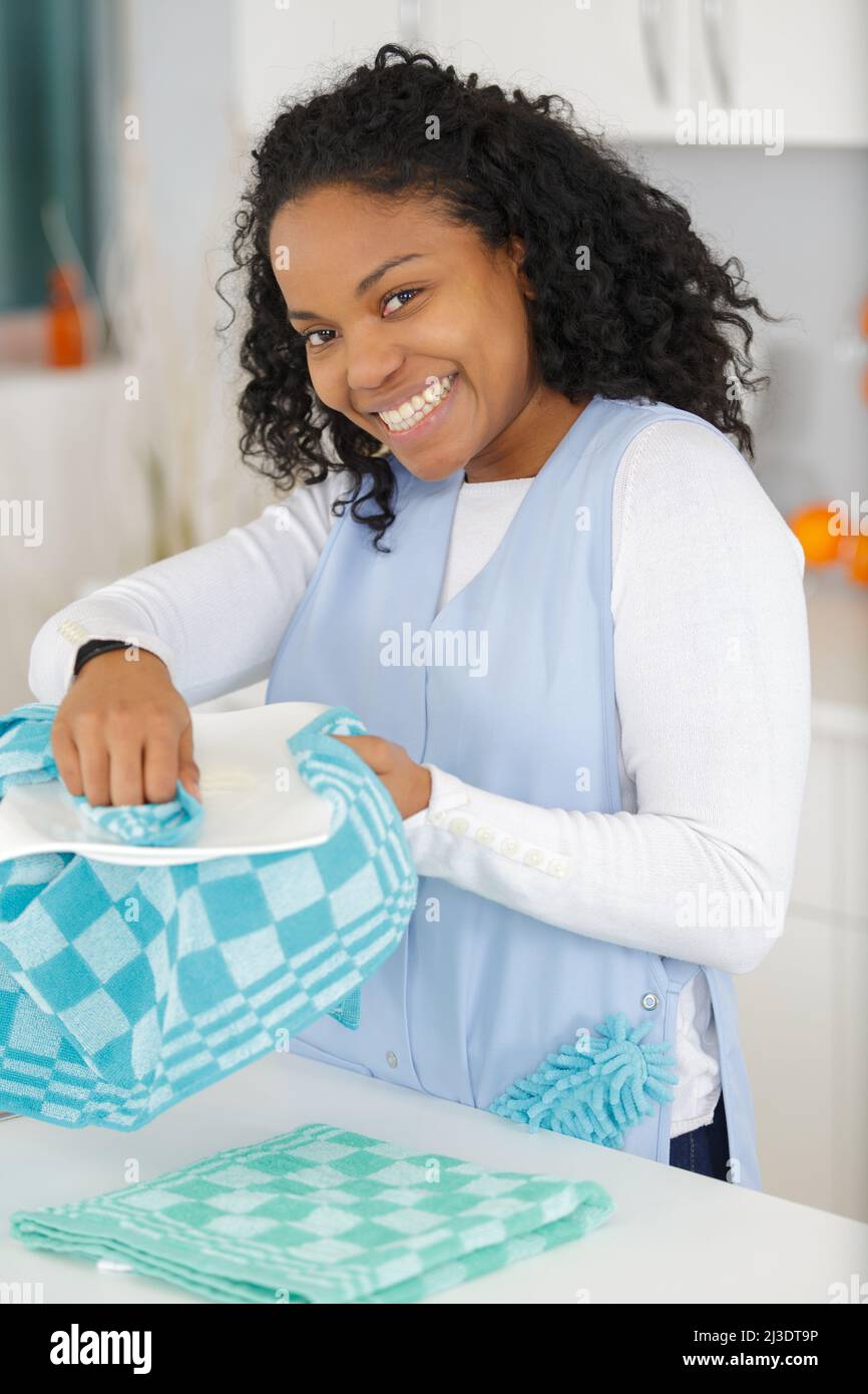 woman washing dishes in the kitchen Stock Photo - Alamy