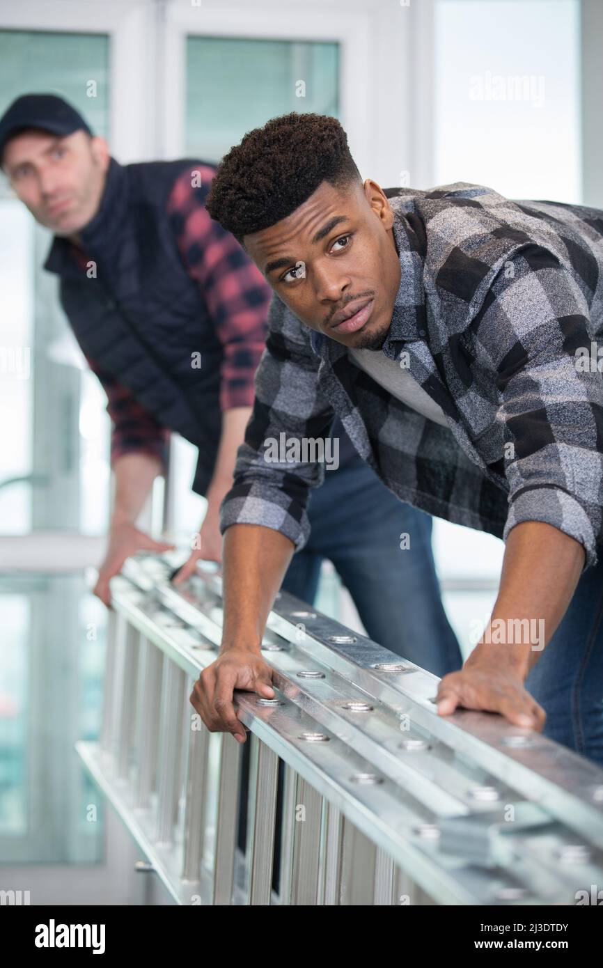 Two wooden ladders hi-res stock photography and images - Alamy