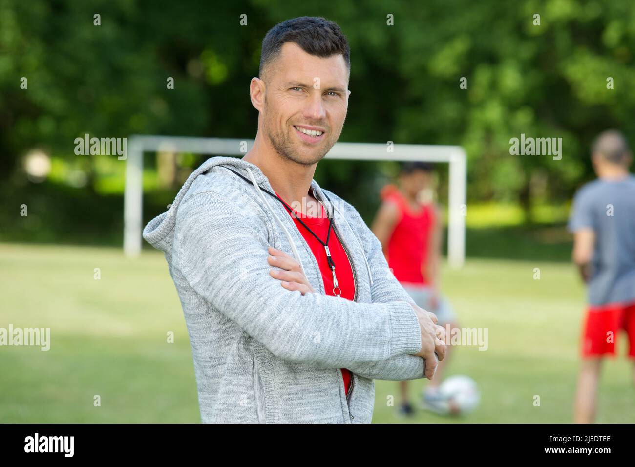 football coach looking at the camera Stock Photo - Alamy