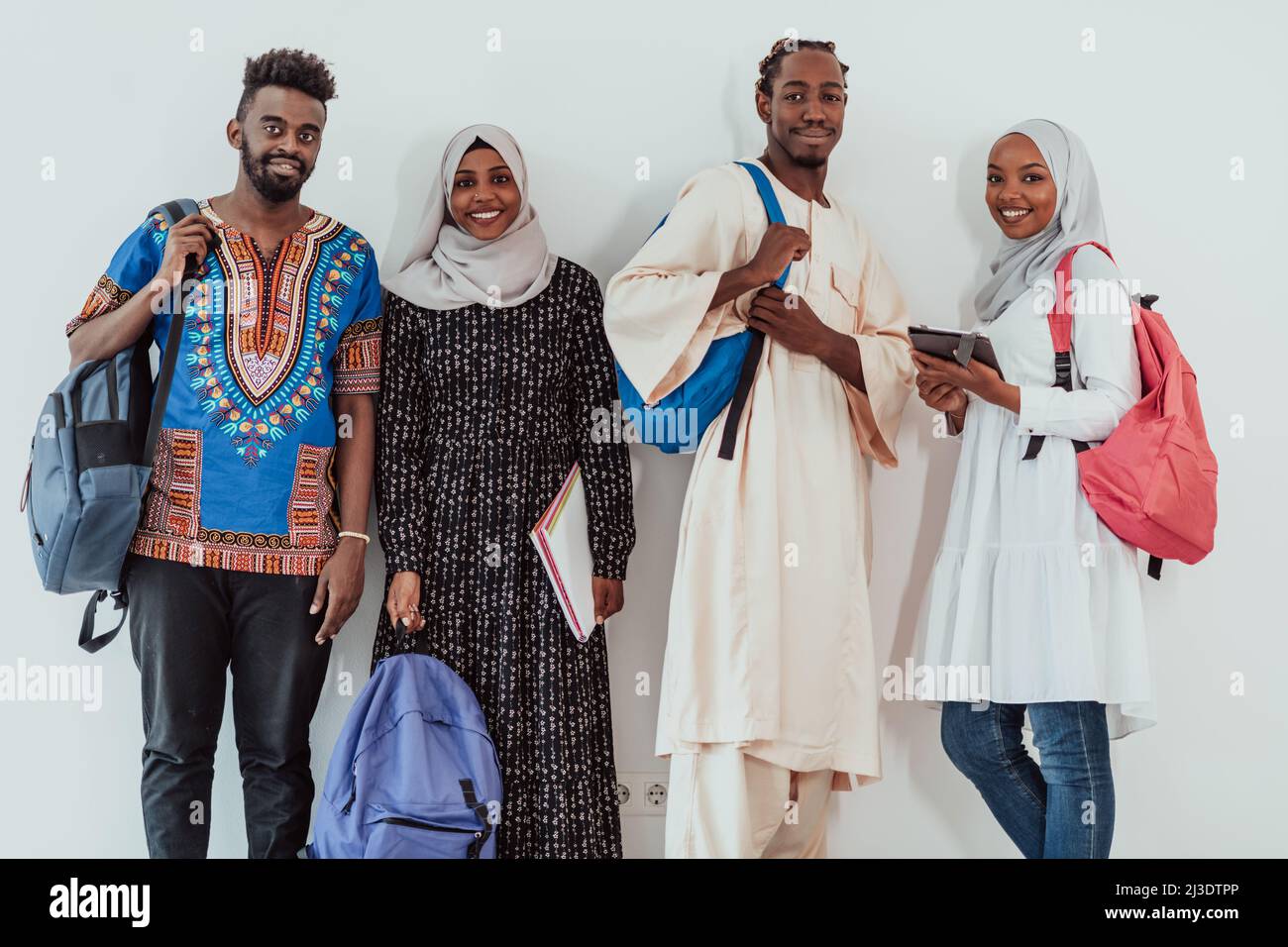 Photo of a group of happy african students talking and meeting together ...