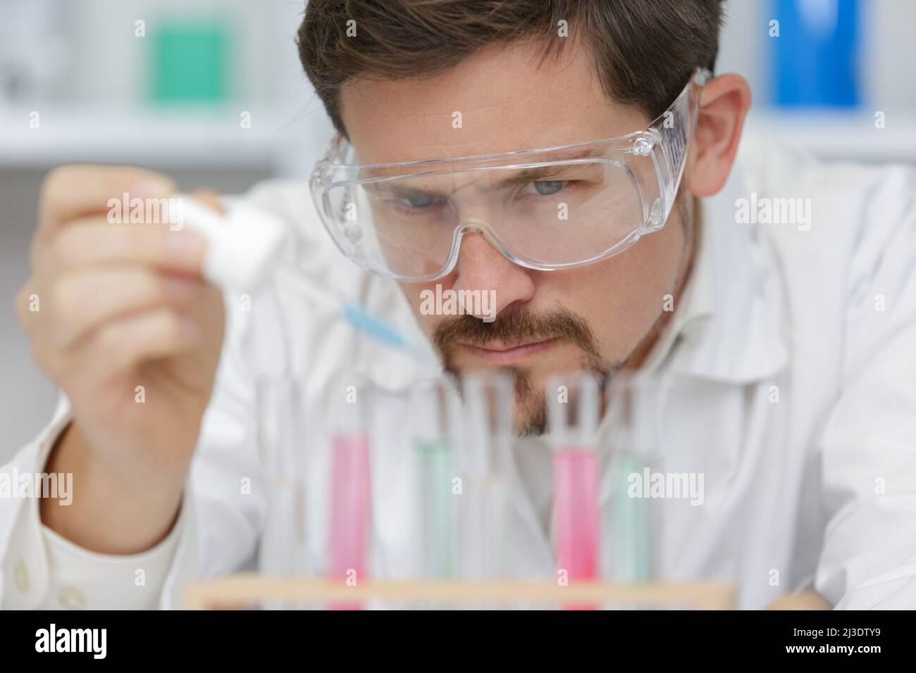mature engineer working in laboratory in the factory Stock Photo - Alamy