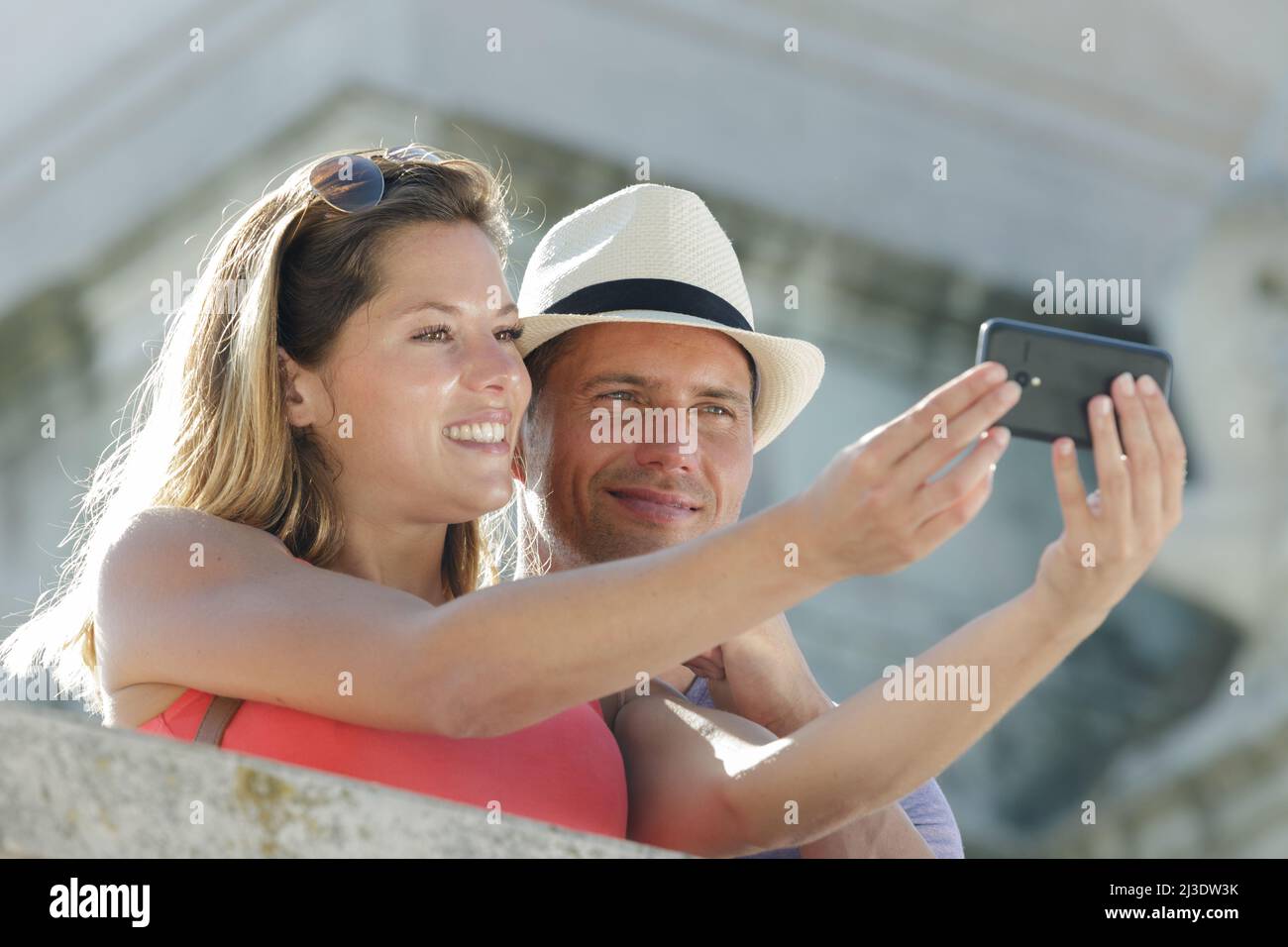 couple taking selfie while having a stroll break Stock Photo - Alamy