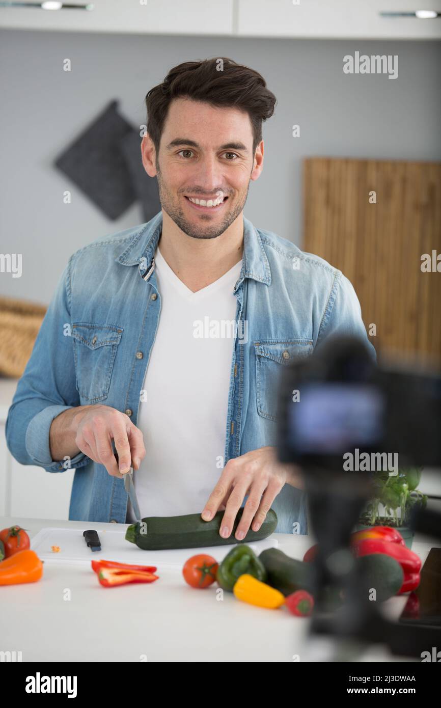 covek is preparing lunch in front of the camera Stock Photo - Alamy