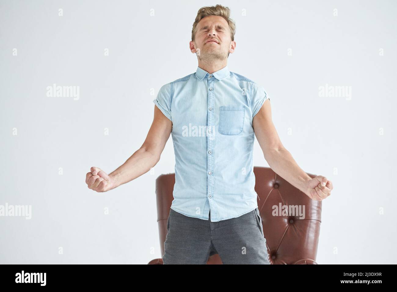Portrait of a stylish intelligent man, small unshaven, charismatic ...