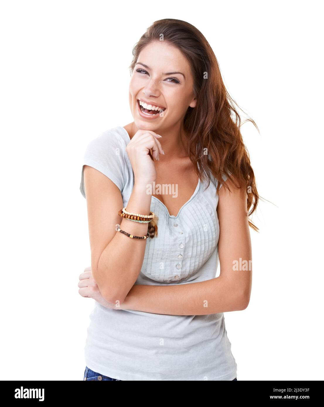 Her laughter is infectious. A pretty young brunette laughing while ...