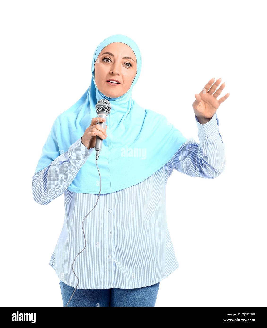 Muslim music teacher with microphone on white background Stock Photo ...