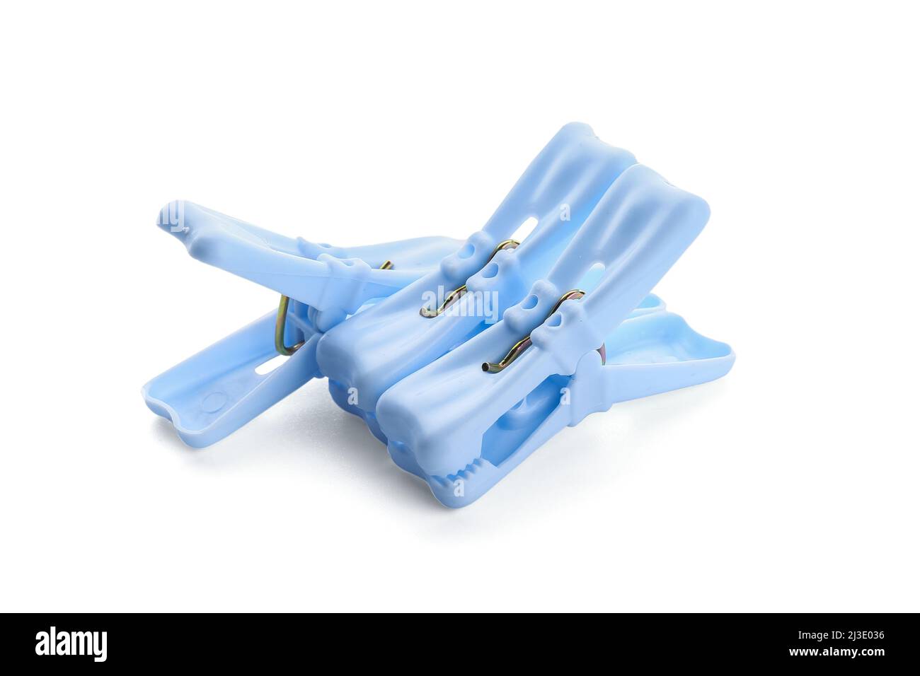 Plastic clothes pins on white background Stock Photo - Alamy