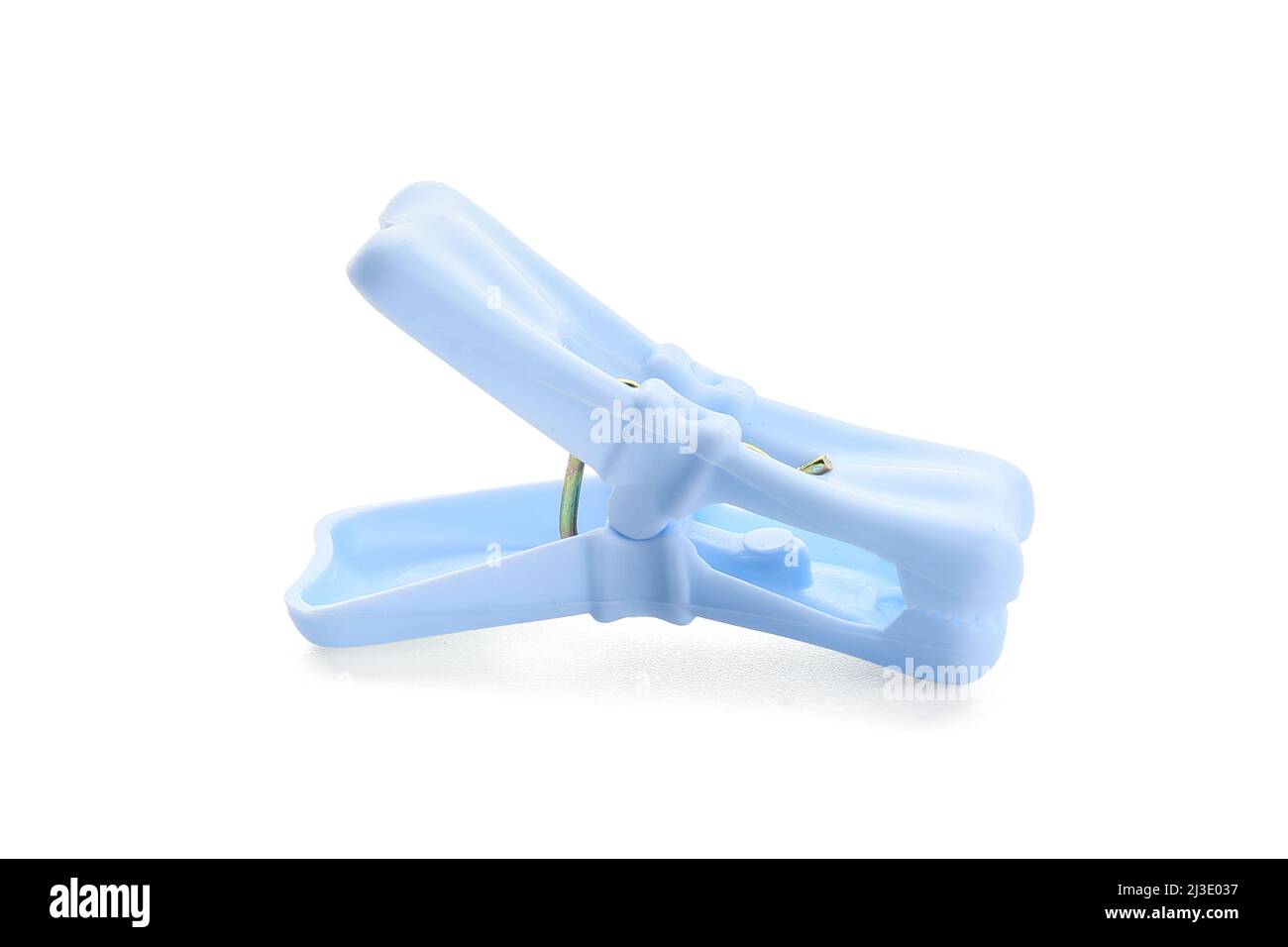 Plastic clothes pin on white background Stock Photo - Alamy