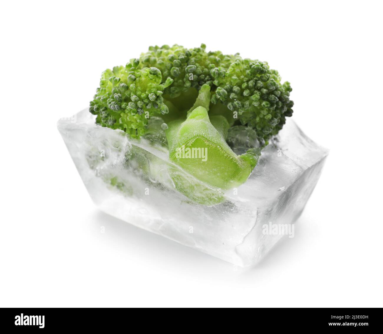 Fresh broccoli frozen in ice on white background Stock Photo - Alamy