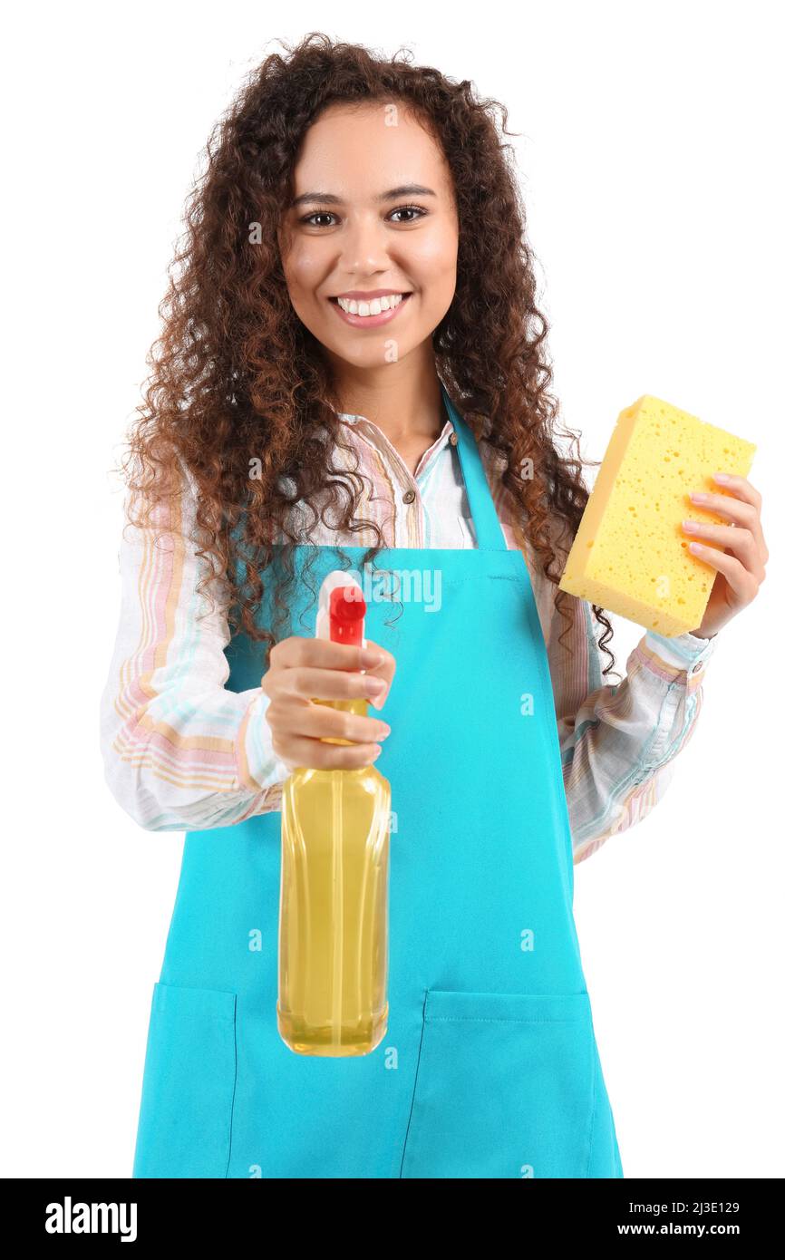 African-American female worker of cleaning service with detergent and ...