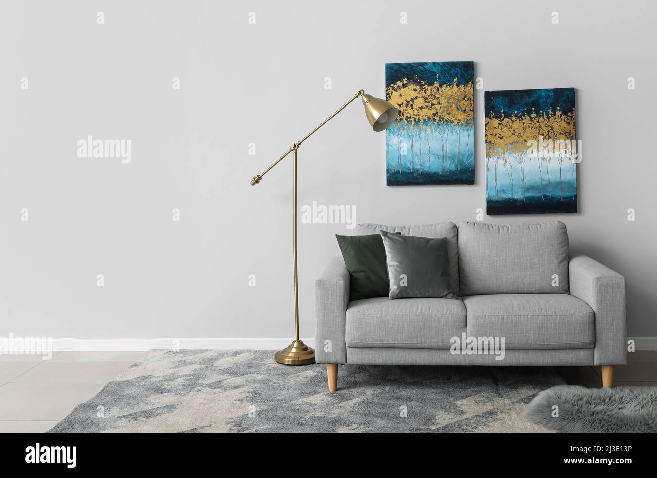 New Sofa With Modern Lamp And Paintings Near Light Wall Stock Photo Alamy new-sofa-with-modern-lamp-and-paintings-near-light-wall-stock-photo-alamy