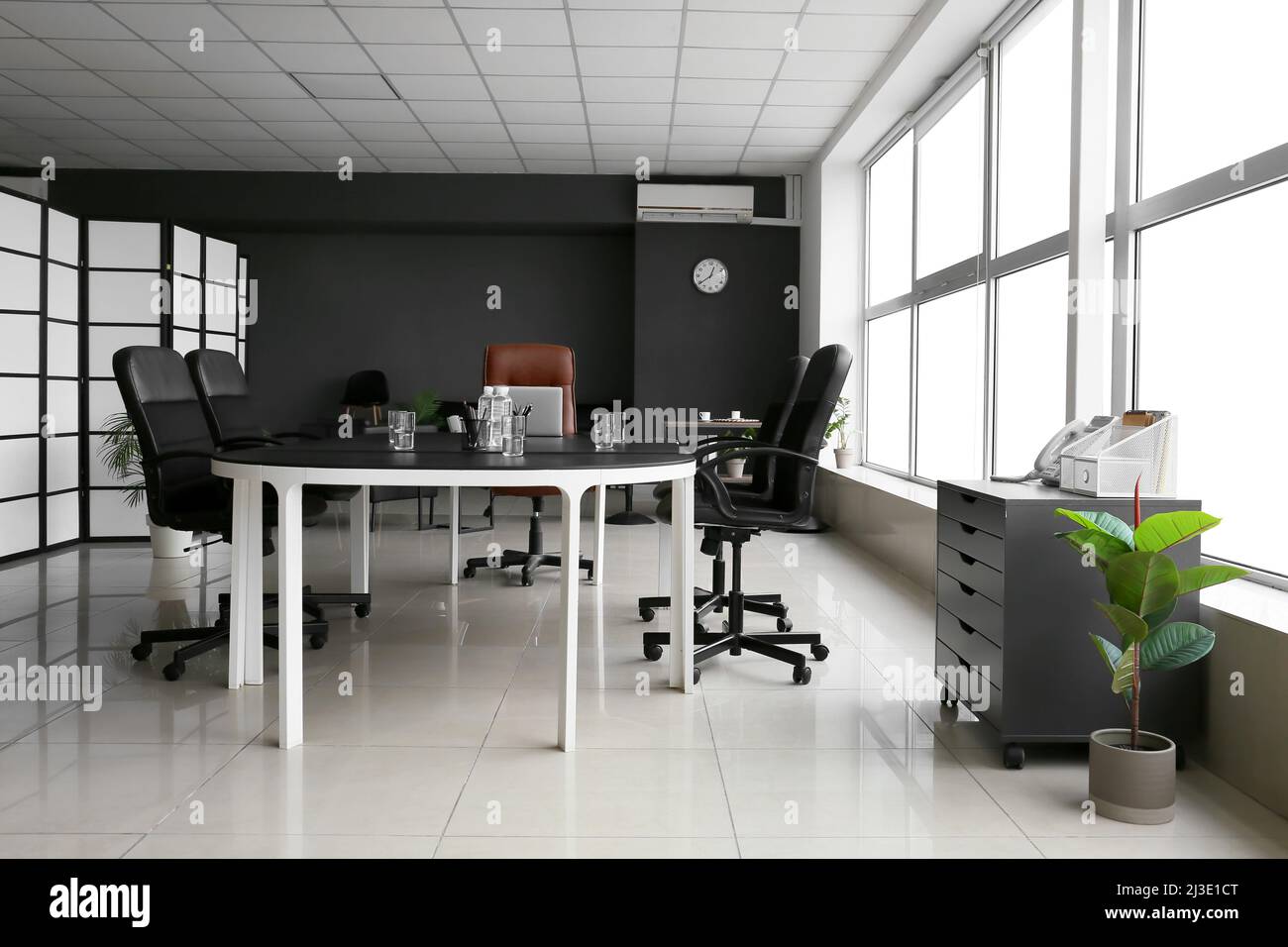 Interior of stylish conference hall with table and chairs Stock Photo ...