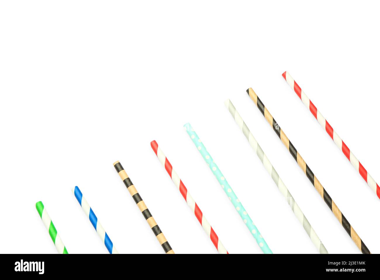 Stylish straws for drinks on white background Stock Photo - Alamy