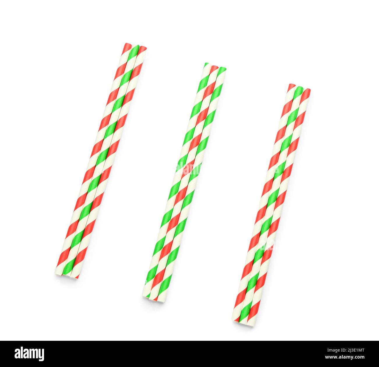 Stylish straws for drinks on white background Stock Photo - Alamy