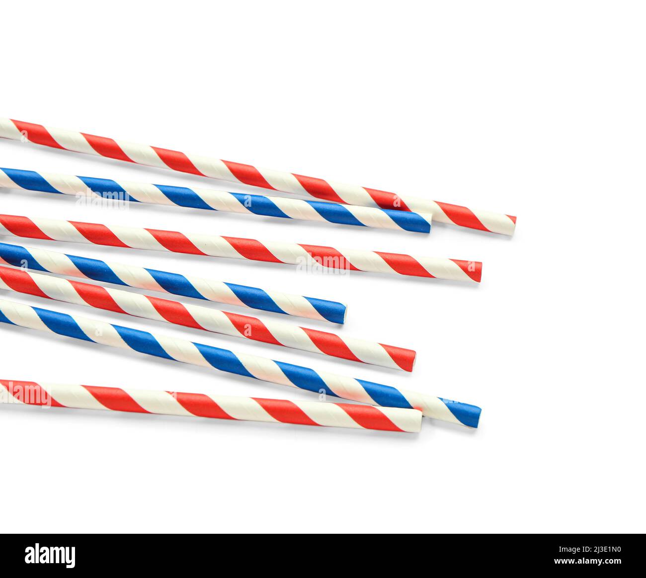 Stylish straws for drinks on white background Stock Photo - Alamy
