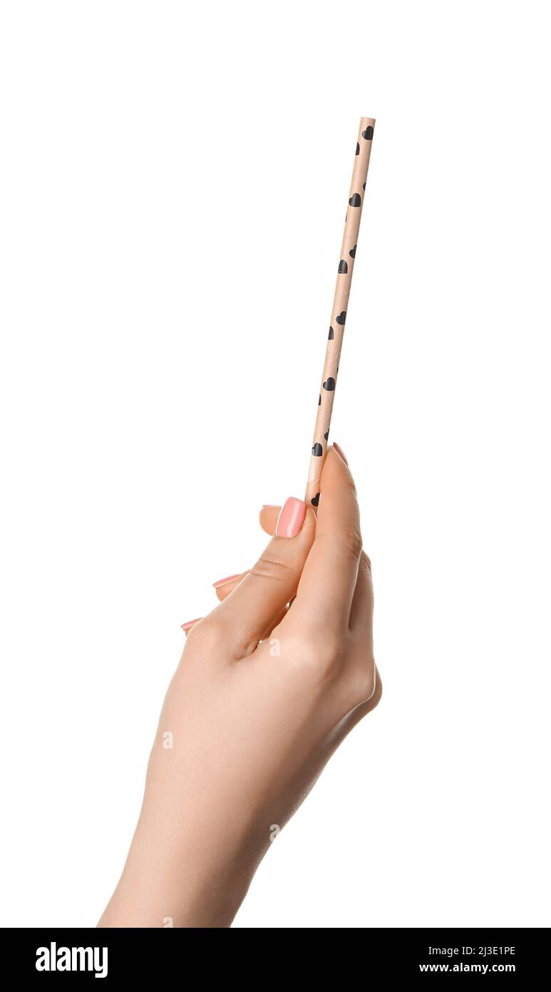 Female hand with stylish straw for drinks on white background Stock ...