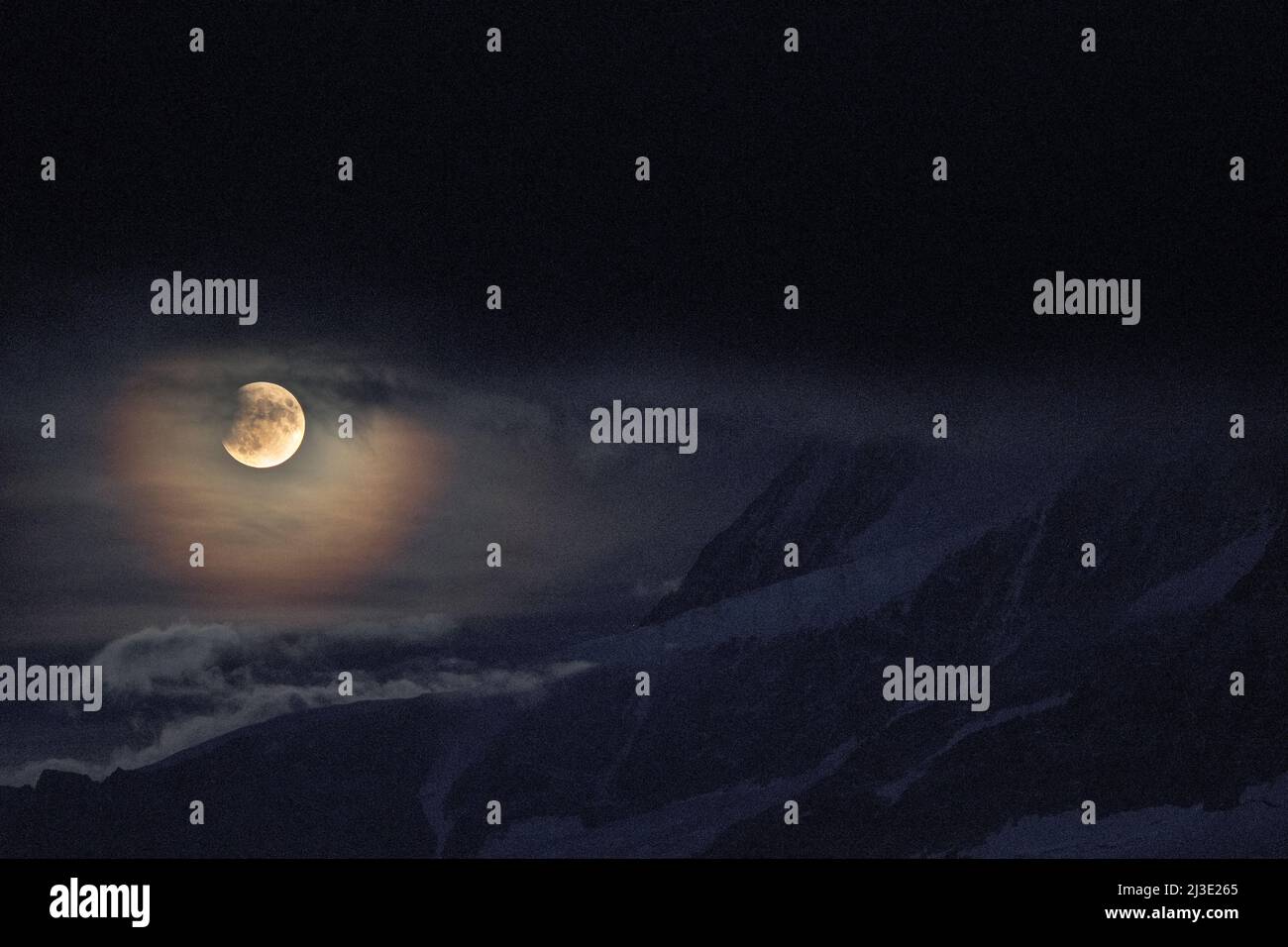 rising full moon near Grindelwald Stock Photo - Alamy