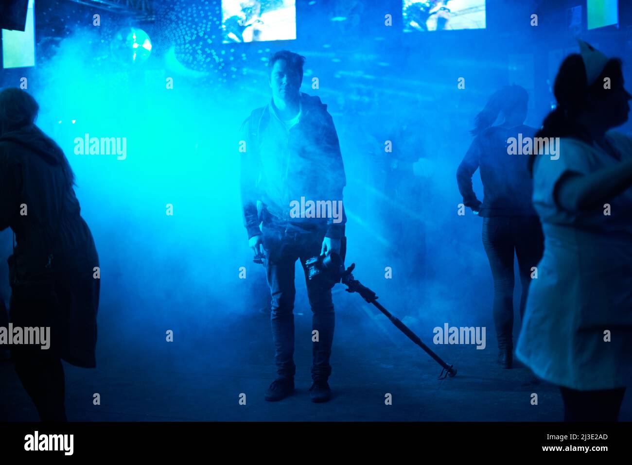 Feeling lost and alone. Portrait of a young man standing isolated from ...