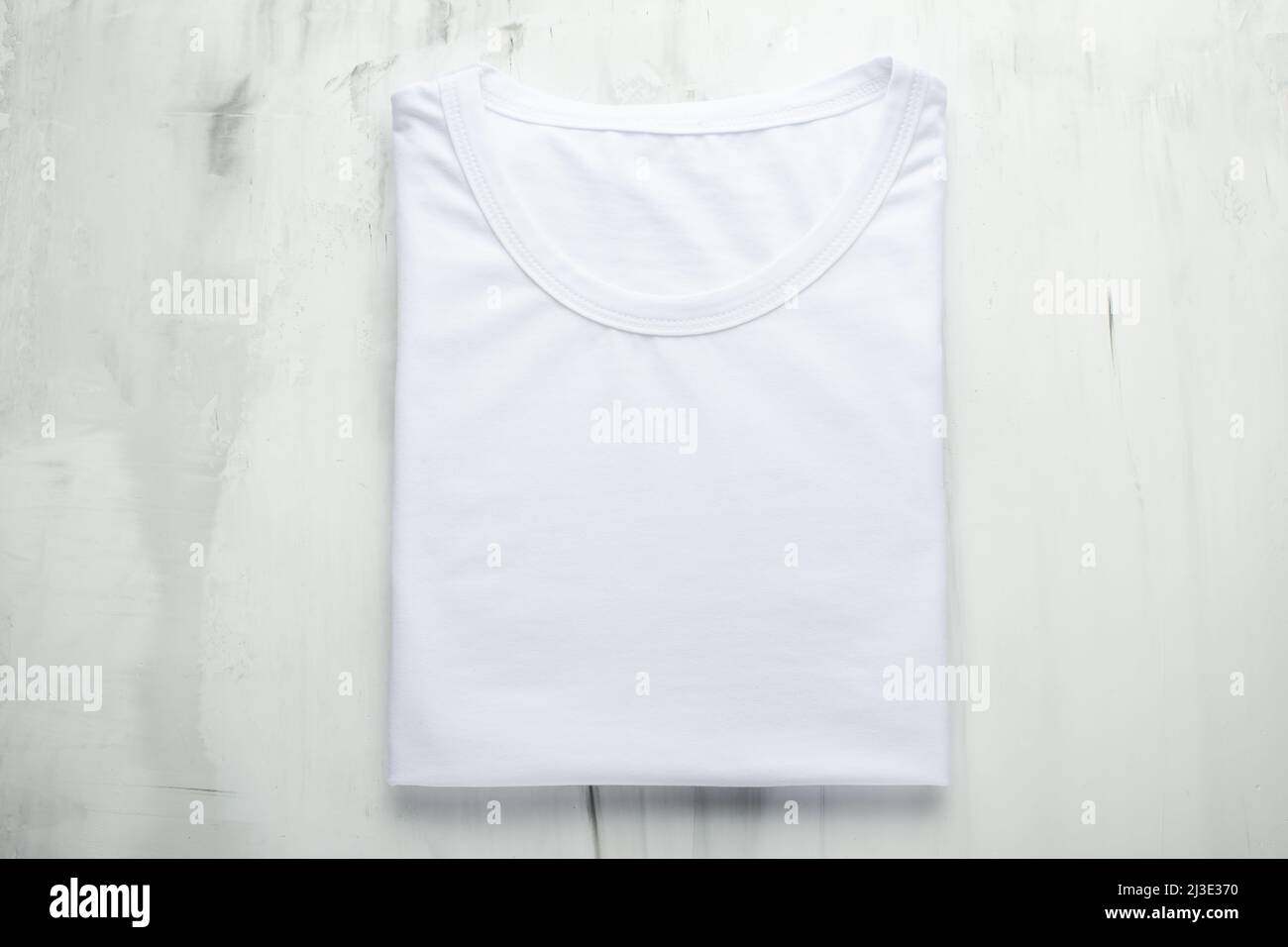 Top view of a white T-shirt on a light background, mocap Stock Photo ...