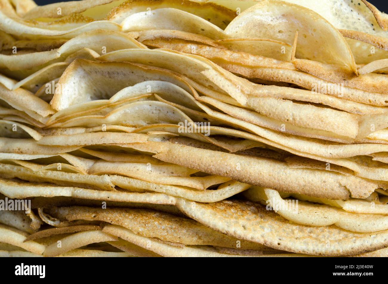 Layers of fresh crepes closeup. A crêpe or crepe is a type of very thin ...