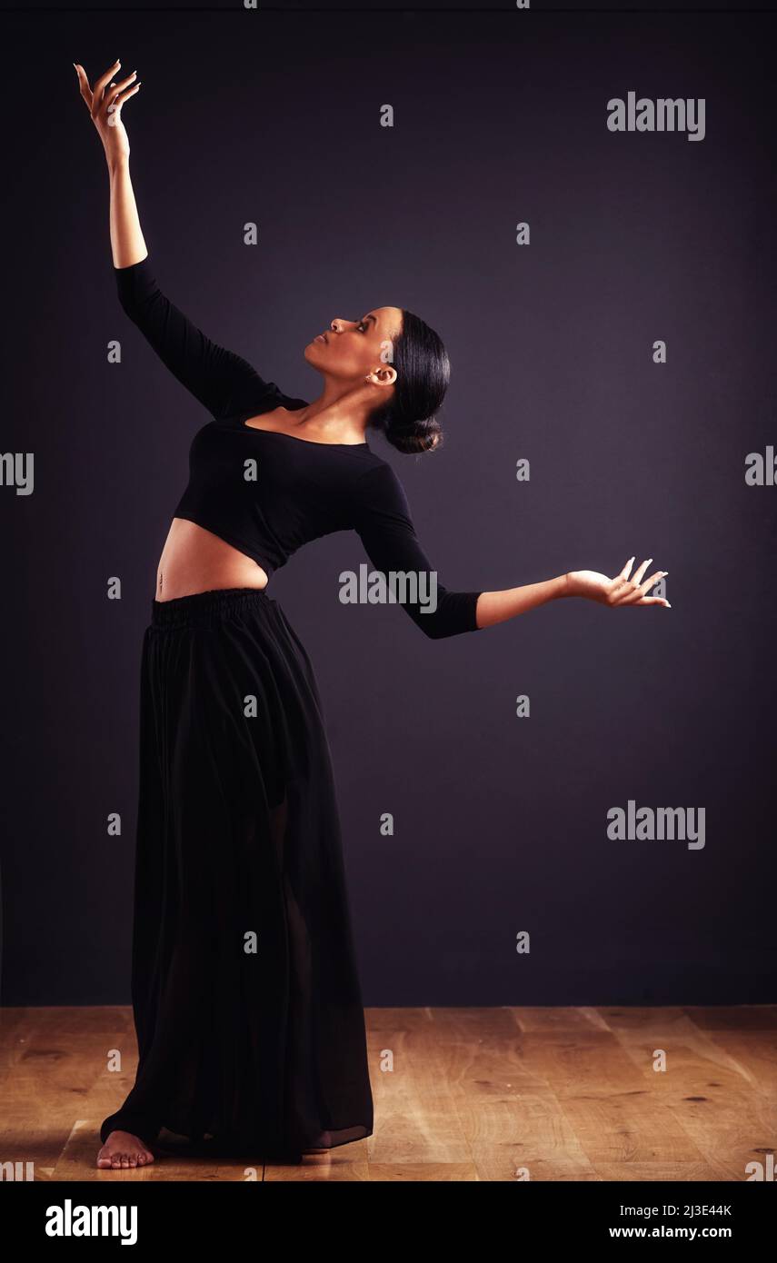 A feel for the theatrical. Female contemporary dancer in a dramatic ...