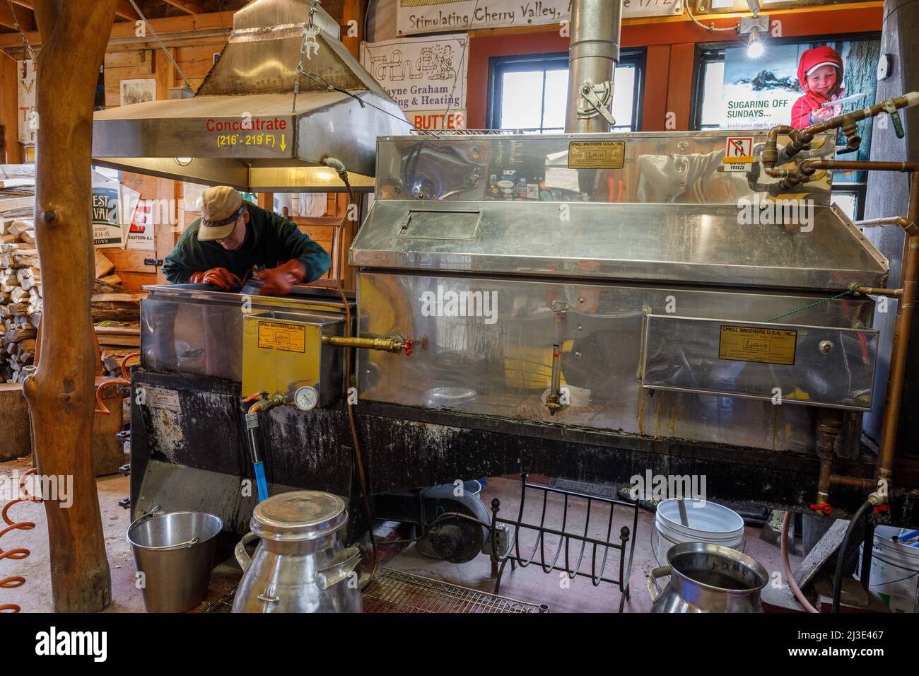 Making maple syrup: Man cleans "sugar sand" out of his evaporator ...