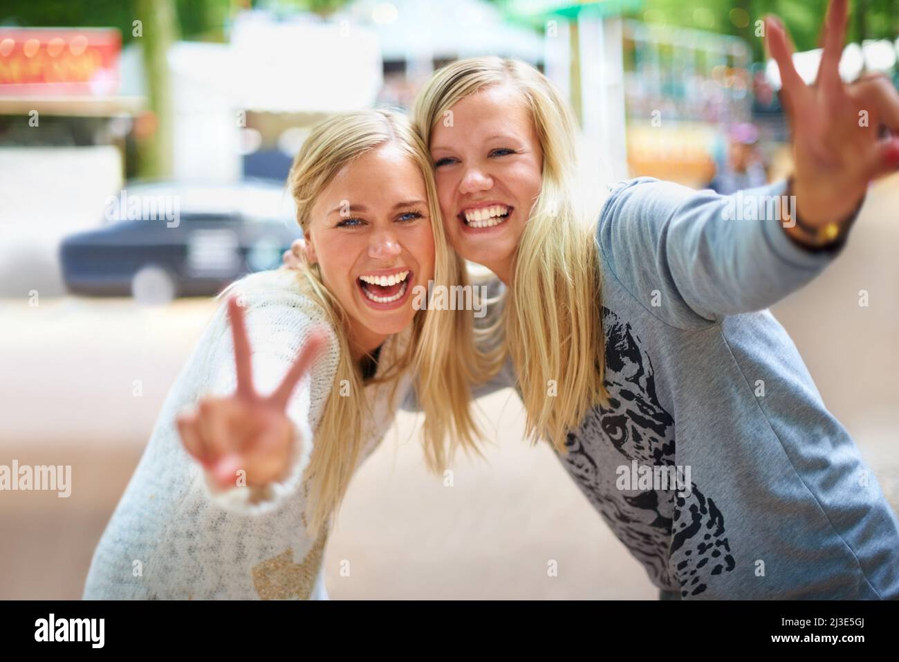 Having fun with my best friend. Two friends having fun at a festival ...
