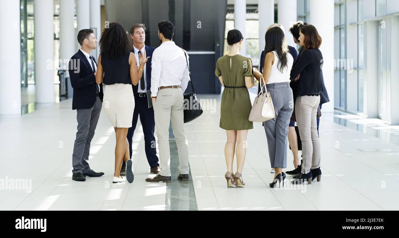 Business meetings can happen anywhere. Full length shot of a group of ...