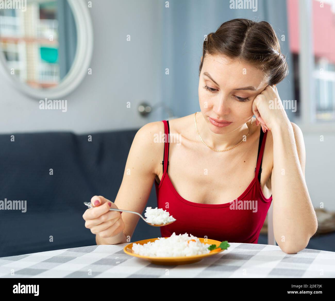 Sad person eating foods hi-res stock photography and images - Alamy
