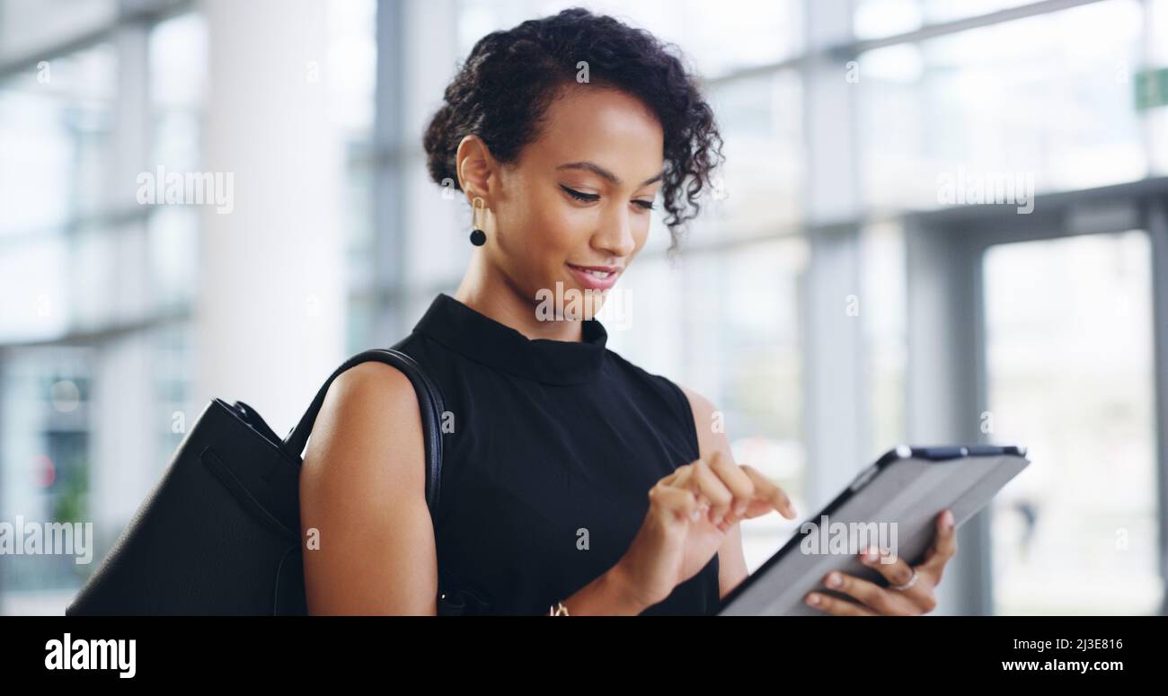 Woman walking tablet device hi-res stock photography and images - Alamy