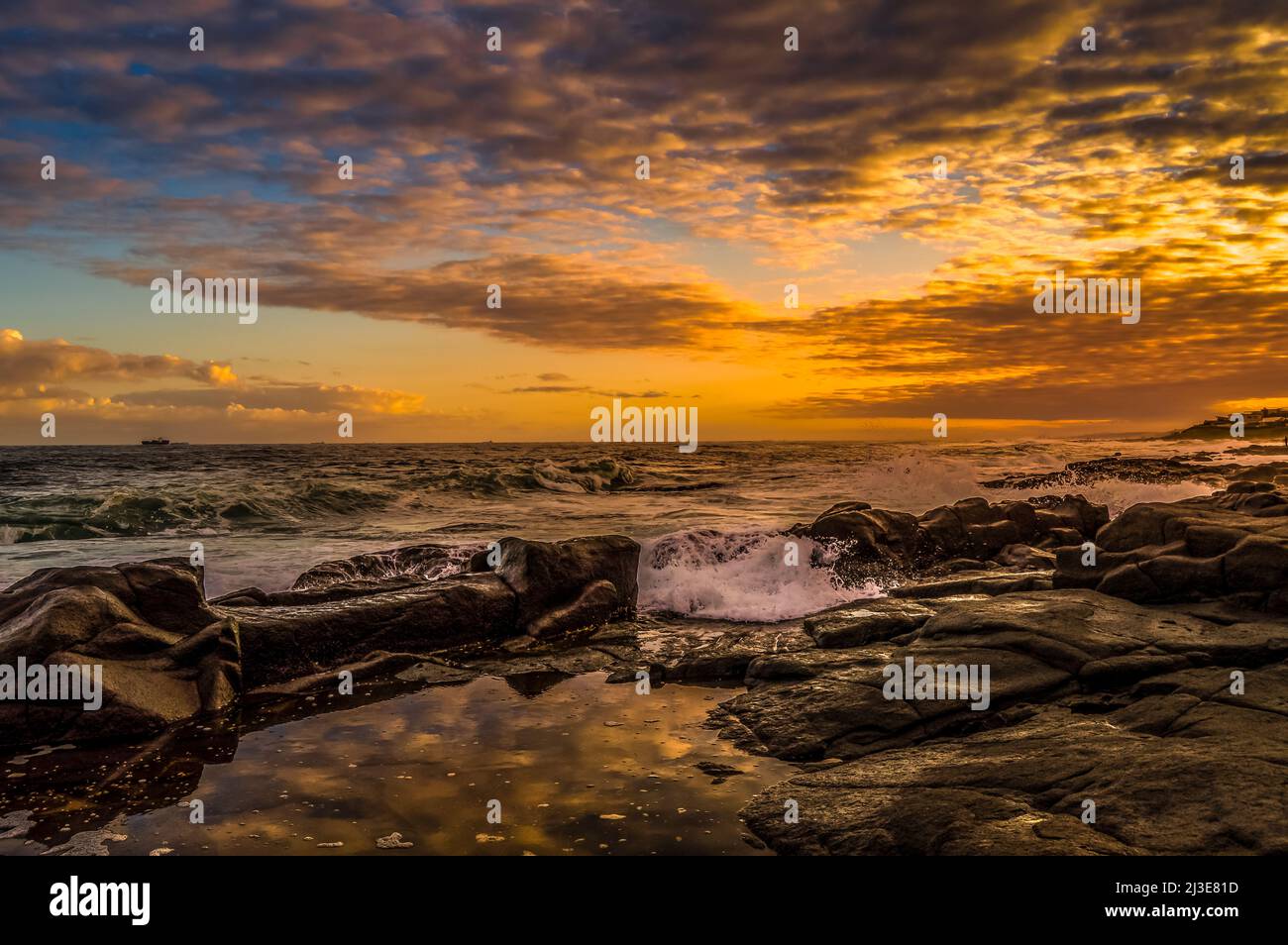 Picturesque and rocky Ballito beach landscape in north Durban , KZN ...