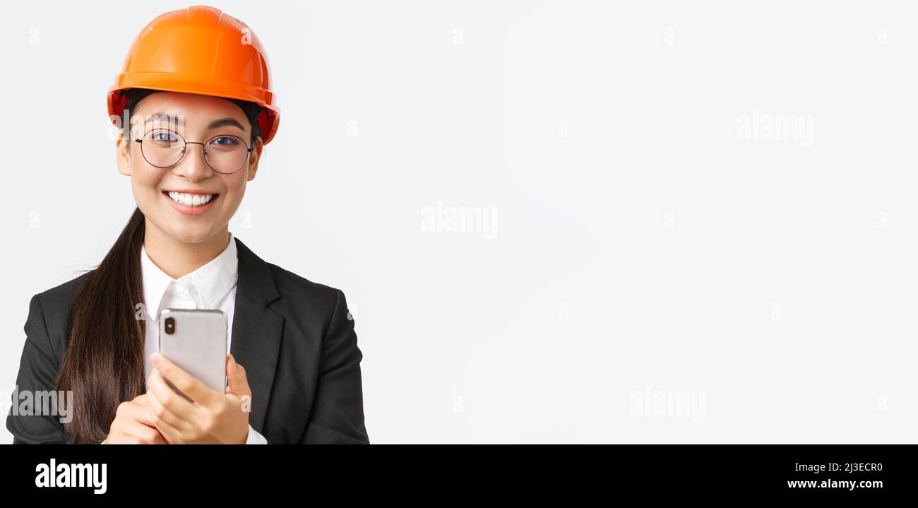 Close-up of successful female chief engineer, construction architect in ...