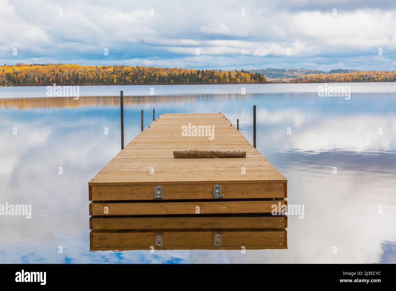 Floating wooden dock on Lac Taureau in autumn, Saint-Michel-des-Saints ...
