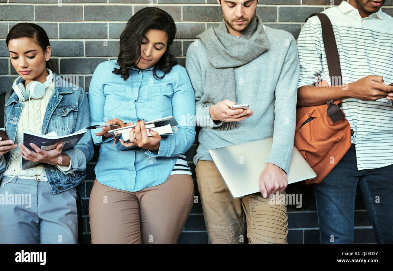 Waiting for first period. Cropped shot of a group of university ...
