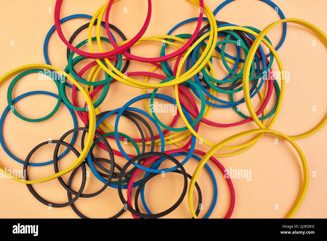 Full Frame Image Flatlay of Multicolored Elastic Rubber Bands on a ...