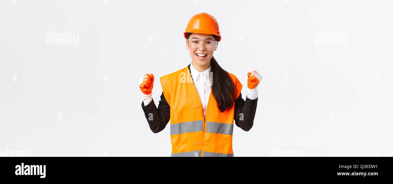 Successful winning female asian engineer, construction architect in ...