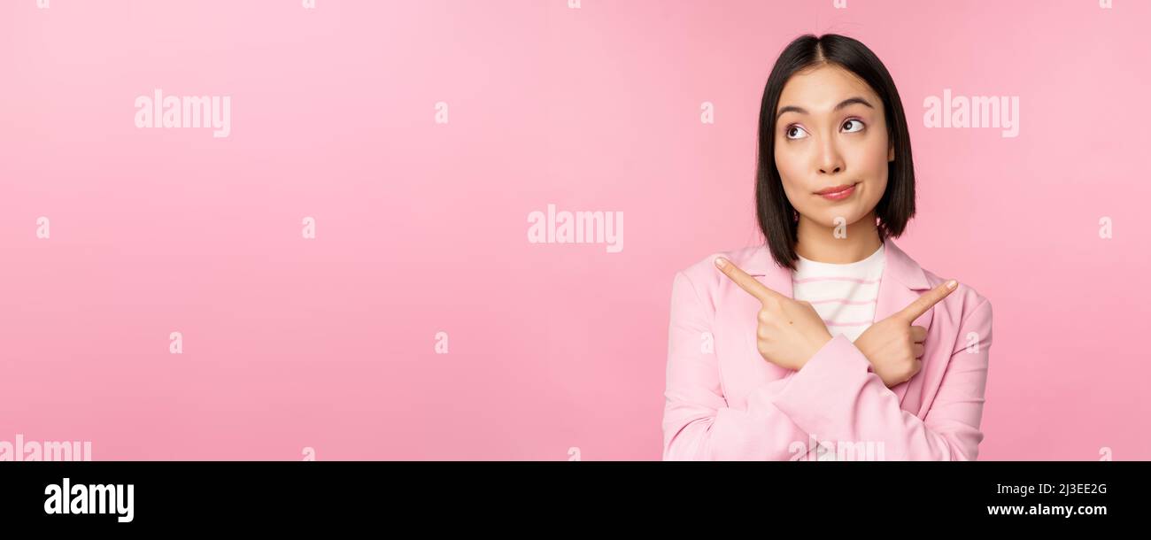 Decision concept. Young asian businesswoman, corporate worker pointing ...